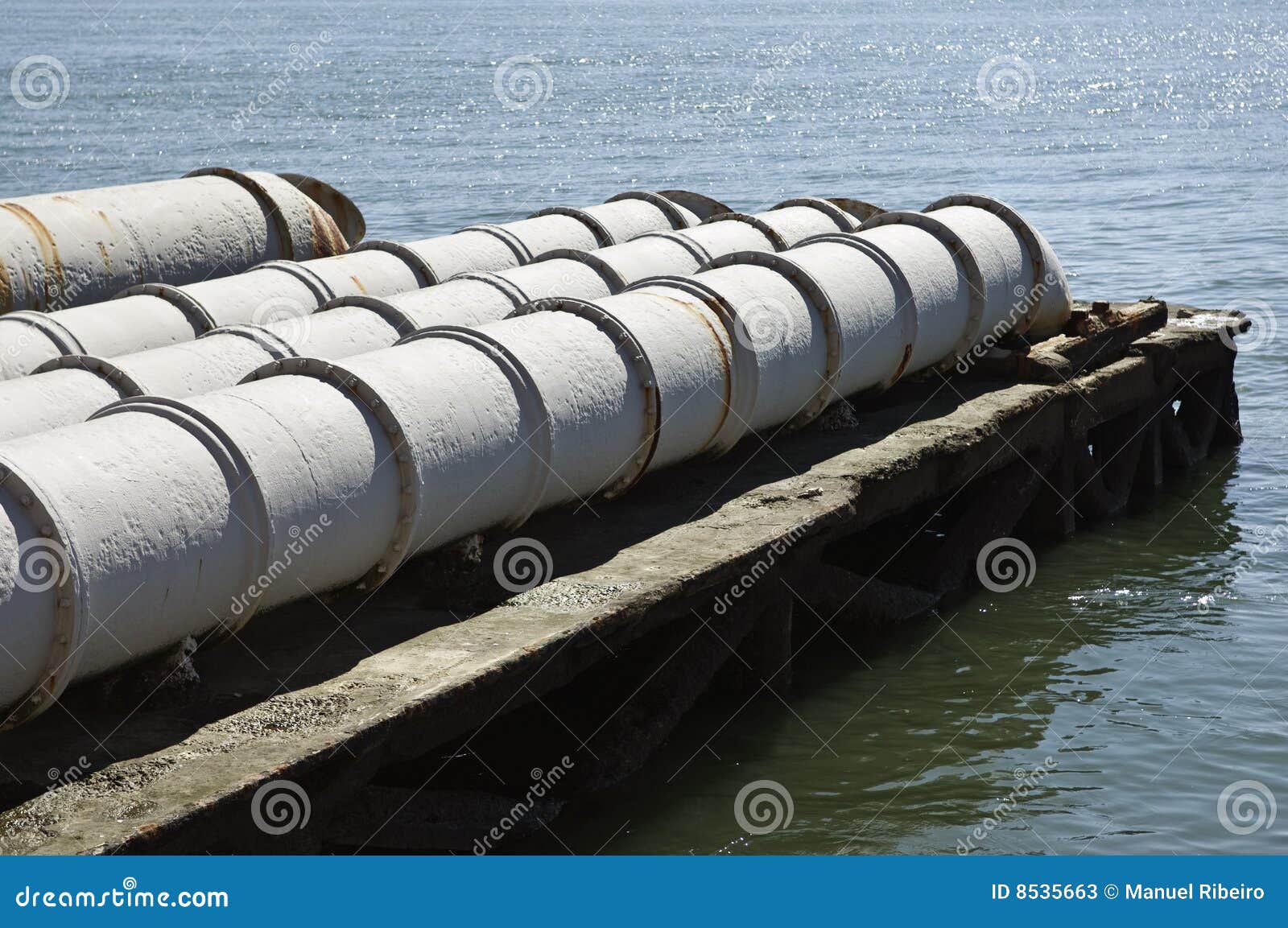 Sewage into the river stock image. Image of group, horizontal - 8535663