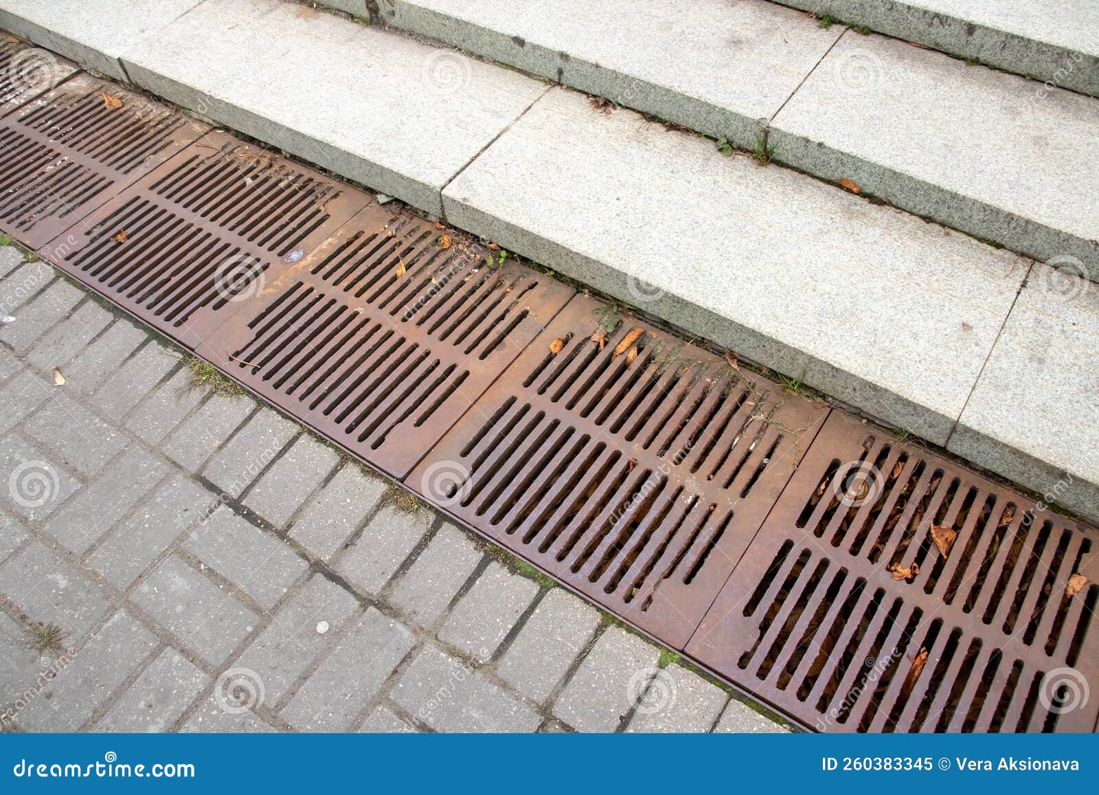 The Sewer Grate on the Sidewalk is Rusty Stock Image - Image of ...