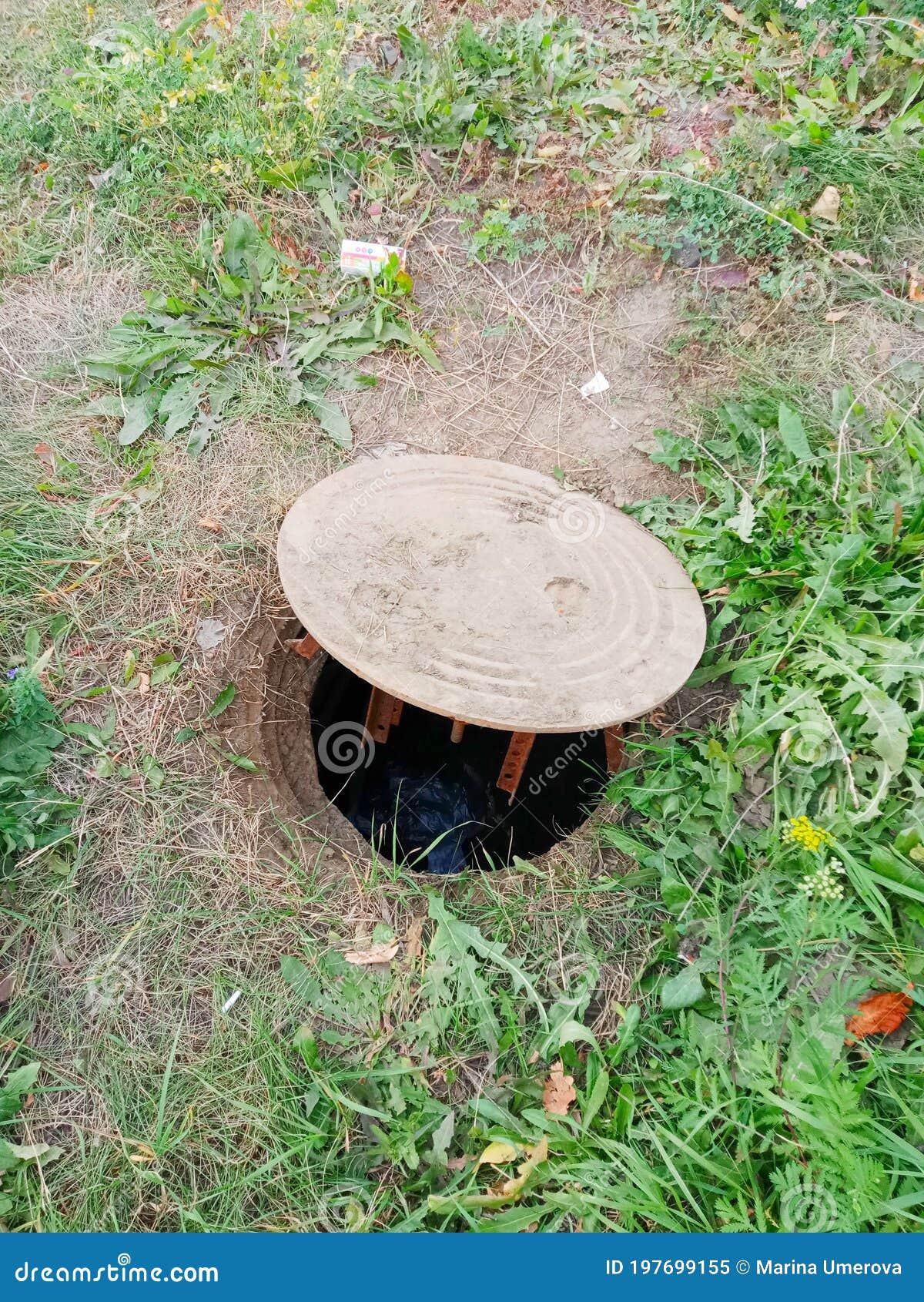 Sewer hatch open lock stock image. Image of open, lock - 197699155