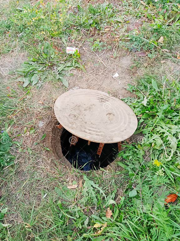 Sewer hatch open lock stock image. Image of open, lock - 197699155