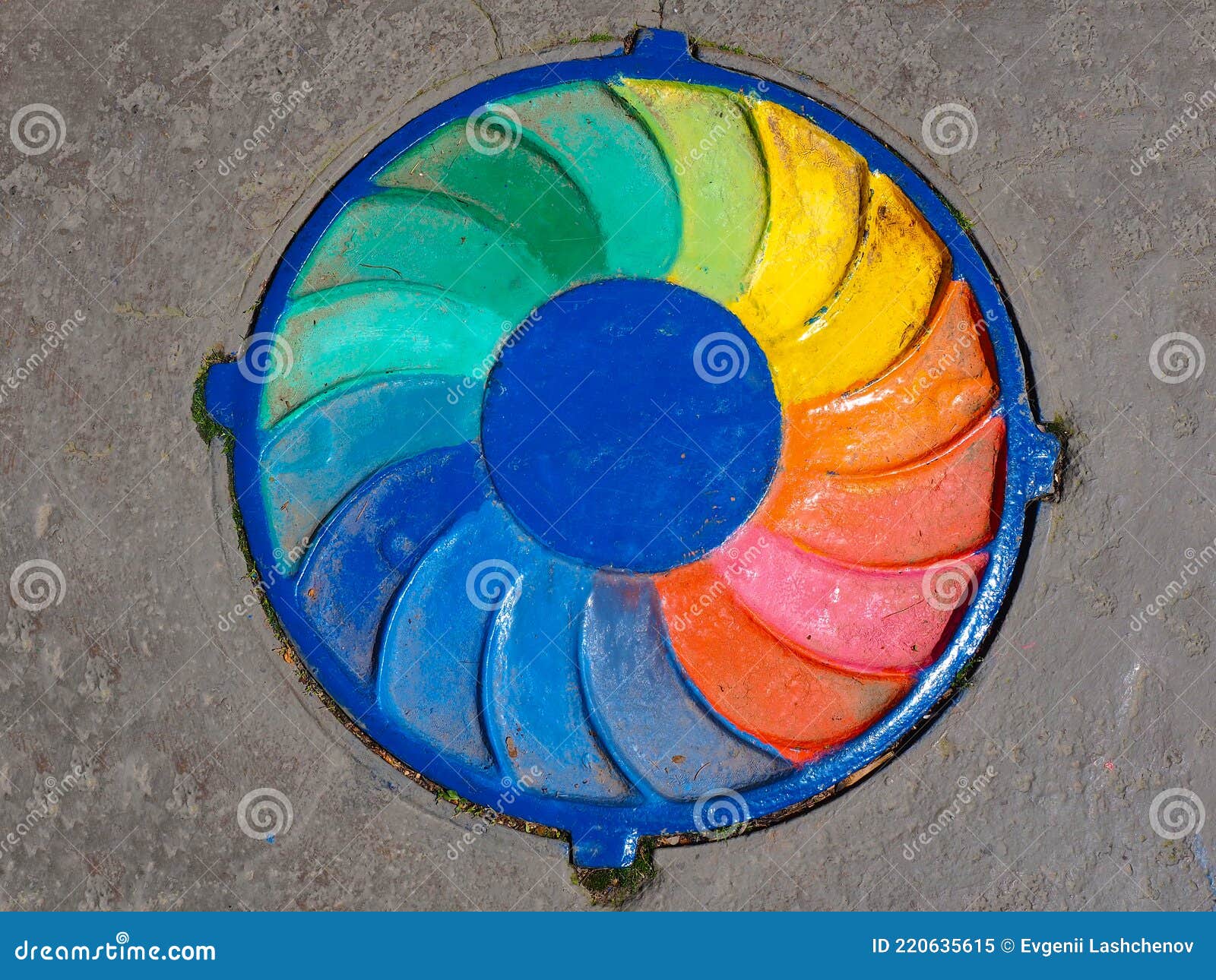 The Sewer Hatch is Painted in the Whole of the Rainbow on a Gray ...