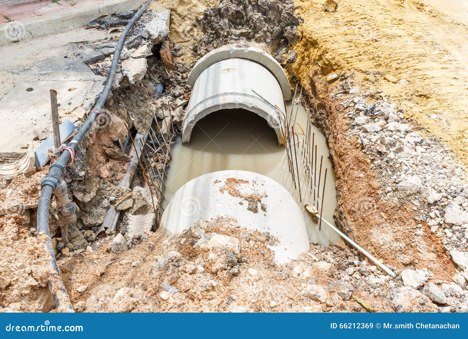 Sewer installation in city stock image. Image of ground - 66212369