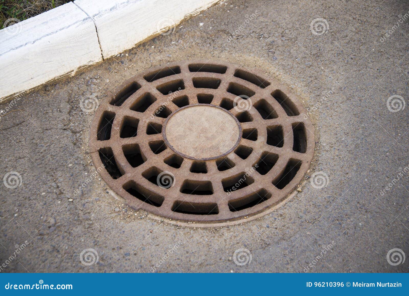 Sewer manhole cover stock photo. Image of drainage, grate - 96210396