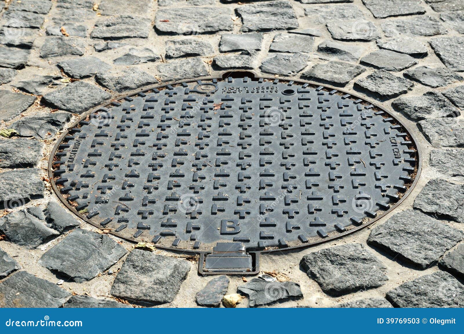 Sewer Manhole on the Stone Pavement Stock Image - Image of stone ...