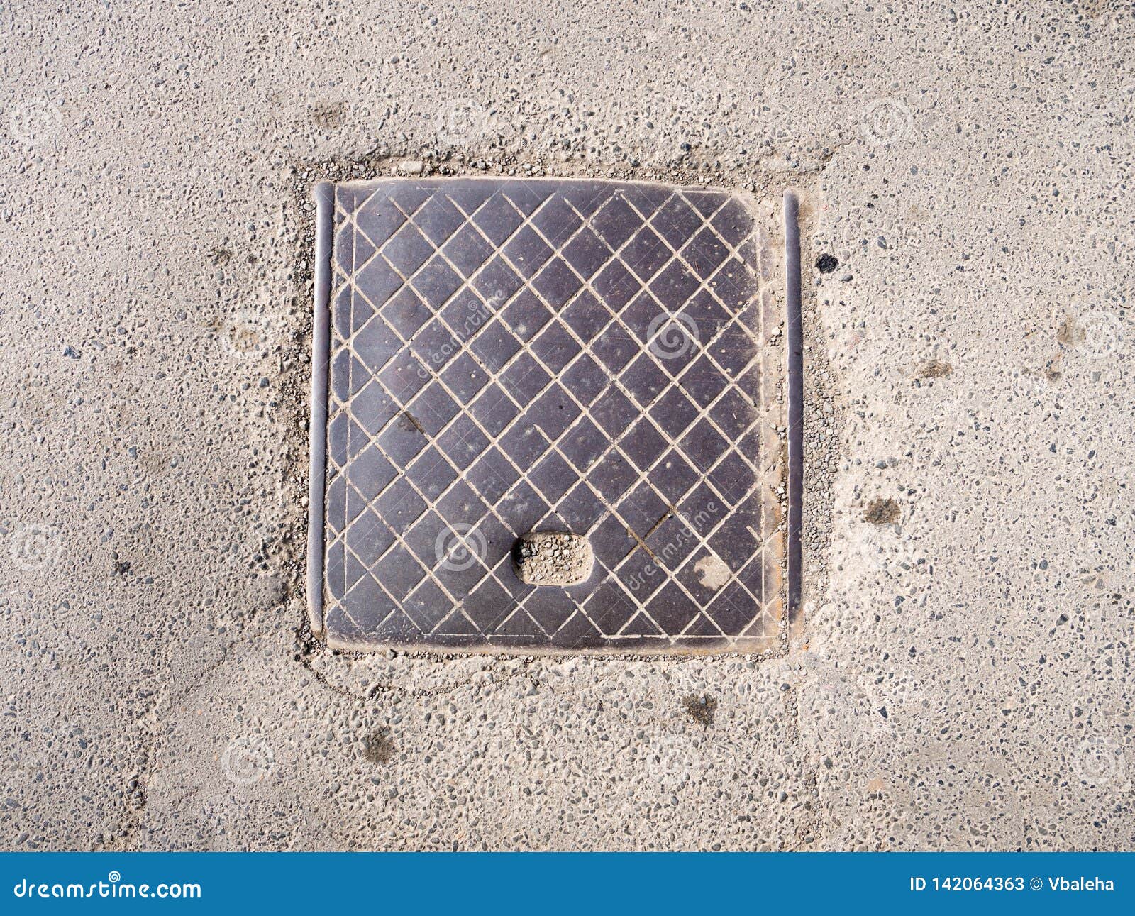 Sewer Metal Hatch on Pavement Stock Image - Image of road, land: 142064363