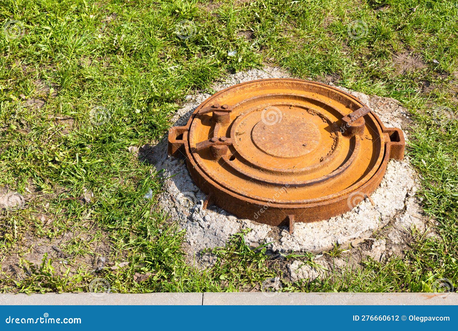 Sewer Rusty Manhole in the Ground on the Street Stock Photo - Image of ...