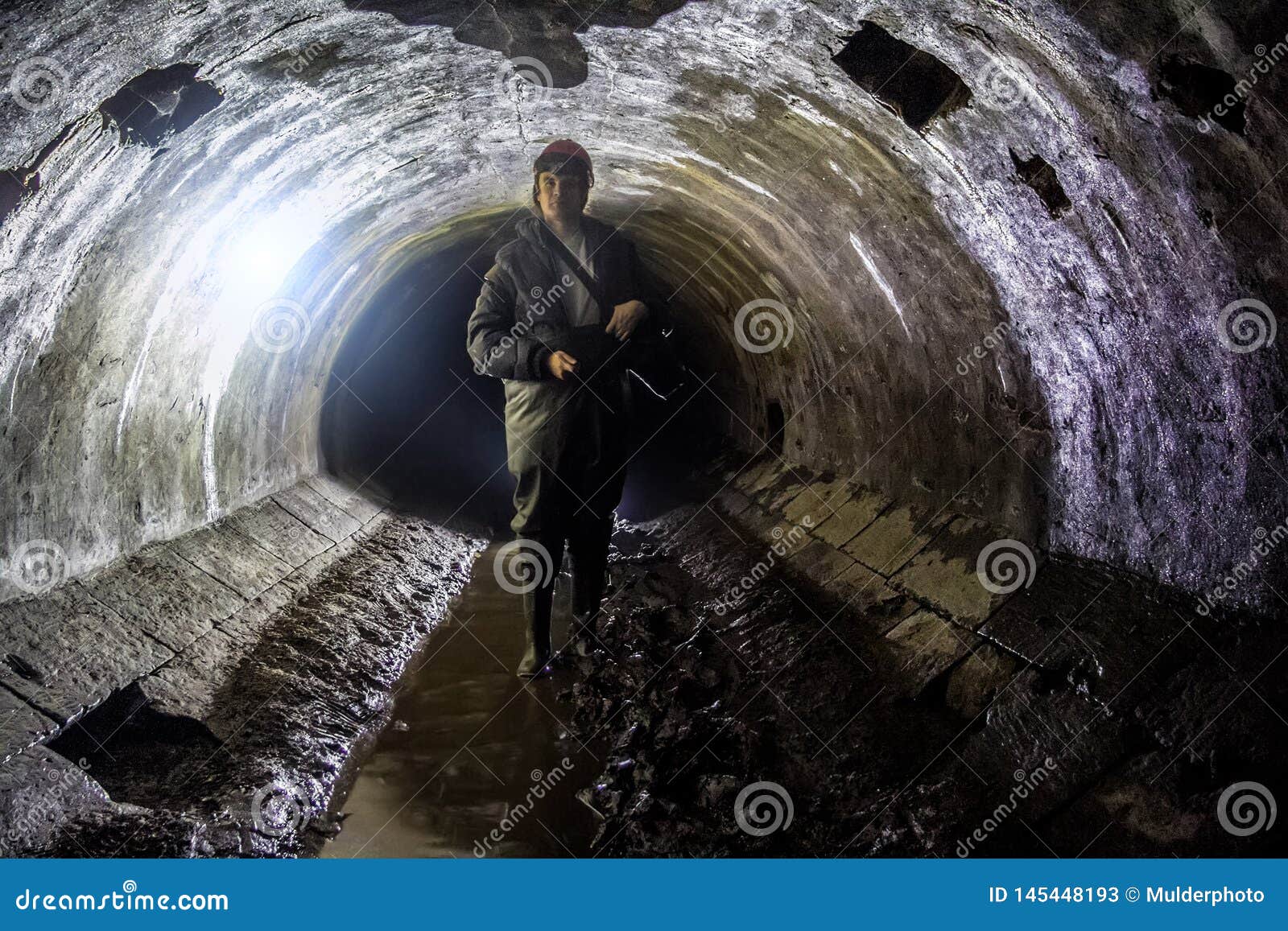 Sewer Worker in Underground Sewer Tunnel Stock Image - Image of ...