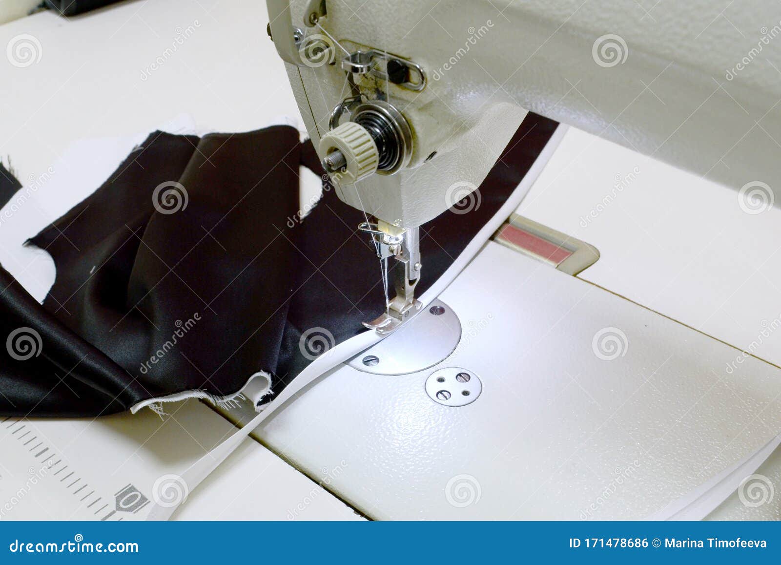 Sewing Black Satin Fabric, Stitching in White Satin on a Sewing Machine ...