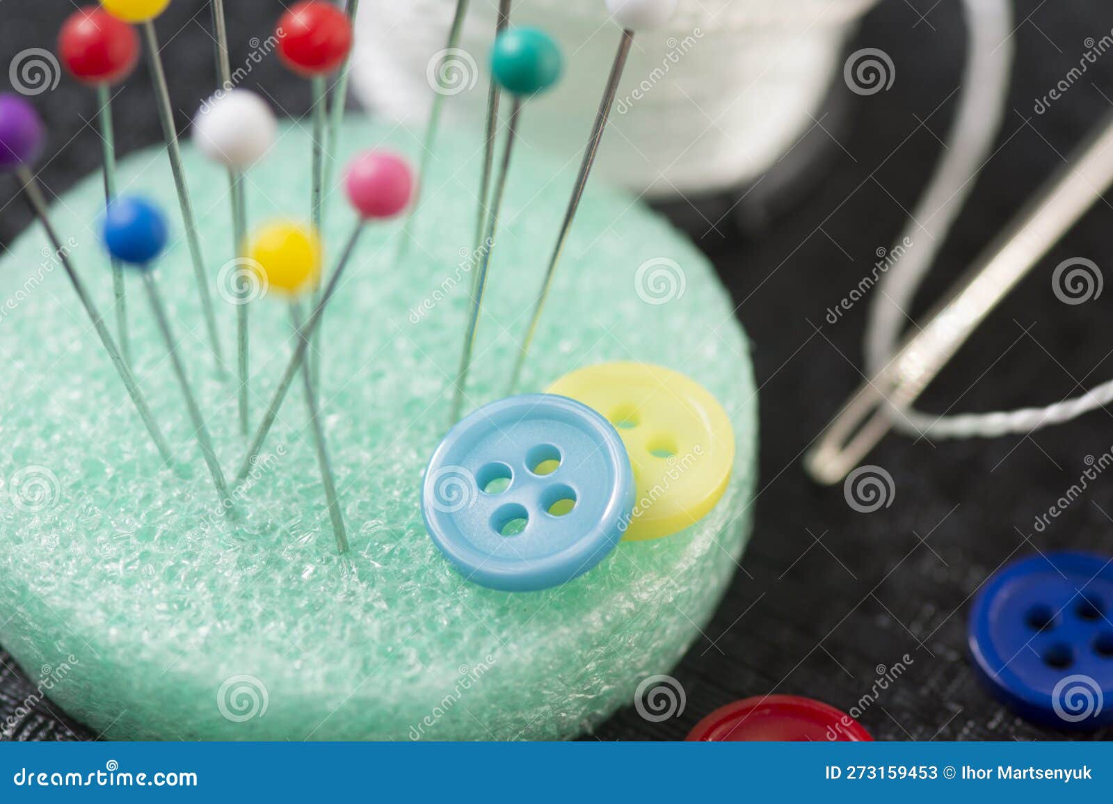 Sewing Buttons To Clothes with a Needle and Thread Stock Image - Image ...