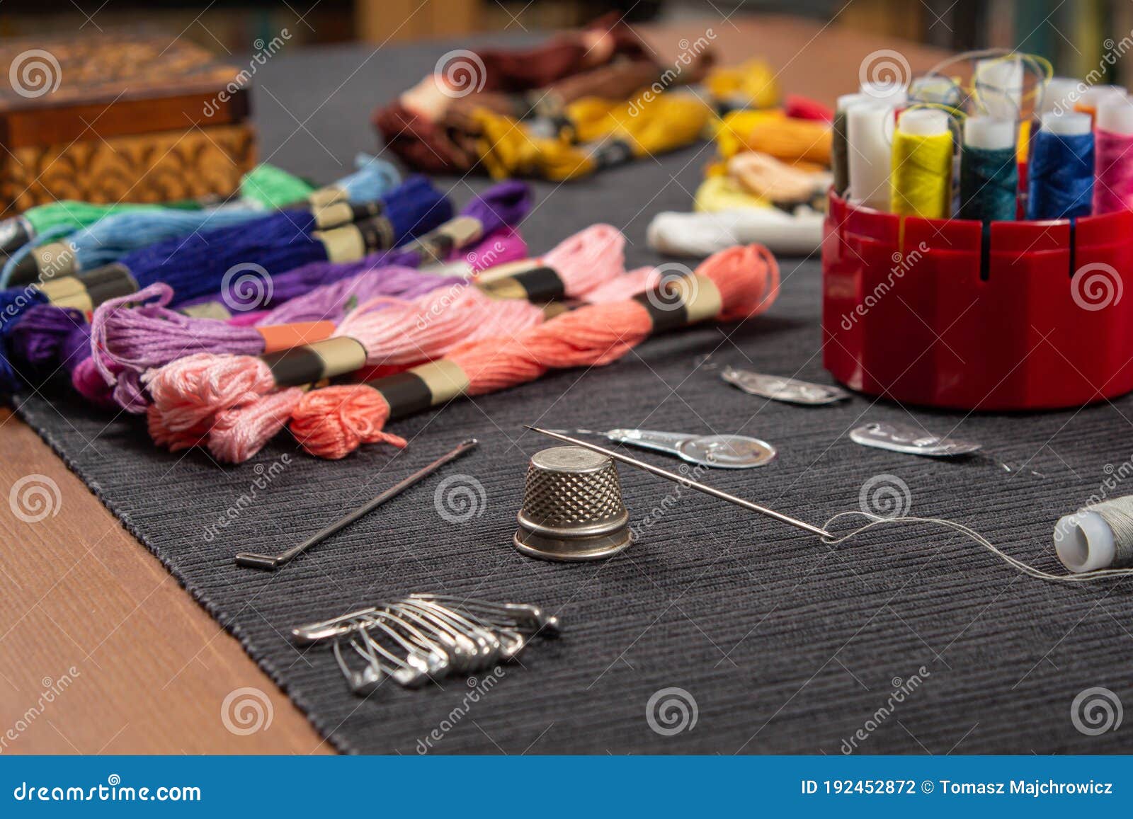 The Sewing Items are on the Table. the Thread is Threaded Over the ...