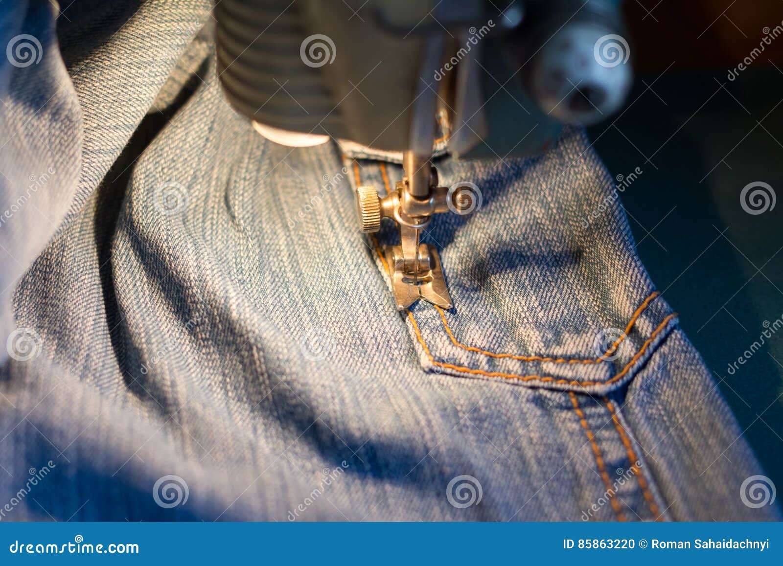Sewing jeans. stock photo. Image of garment, manufacturing - 85863220