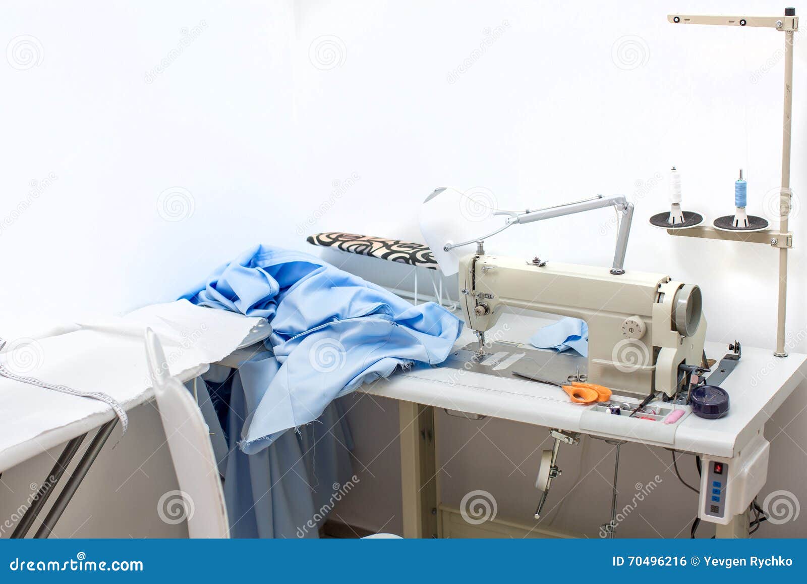 Sewing Machine and the Blue Cloth Stock Photo - Image of dressmaker ...
