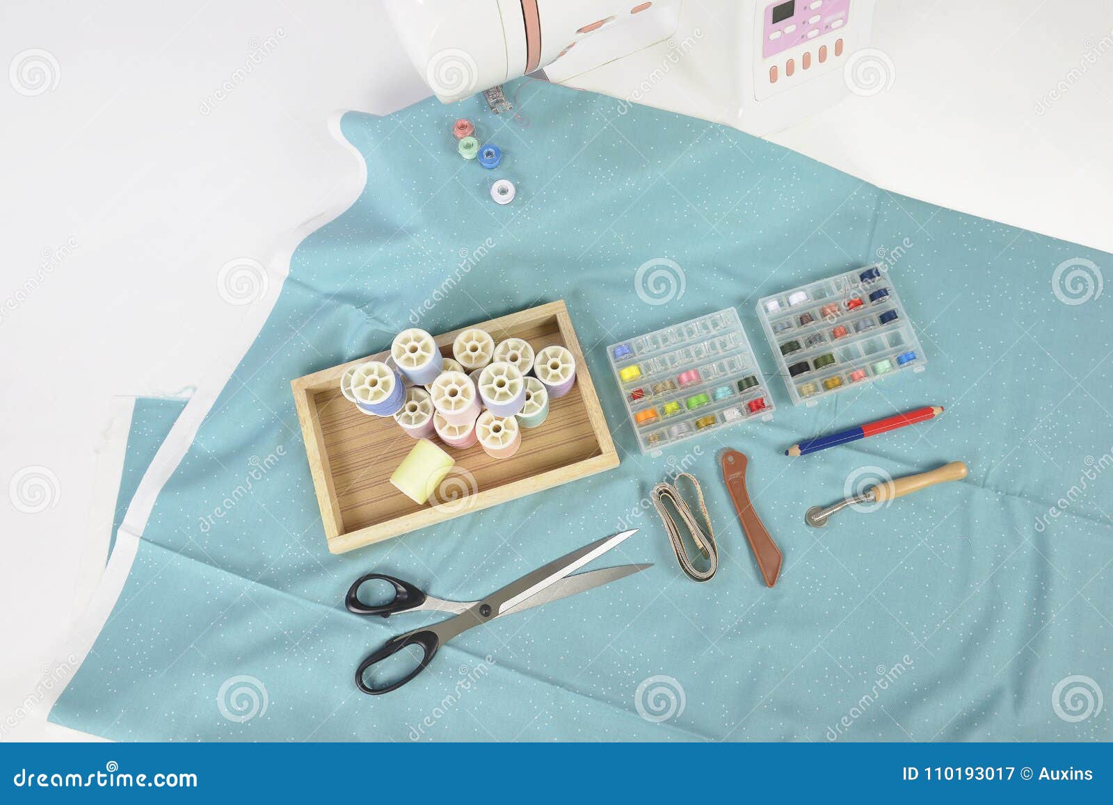 Sewing Machine and Colorful Thread Rolls, Scissors, Fabric and a Stock ...