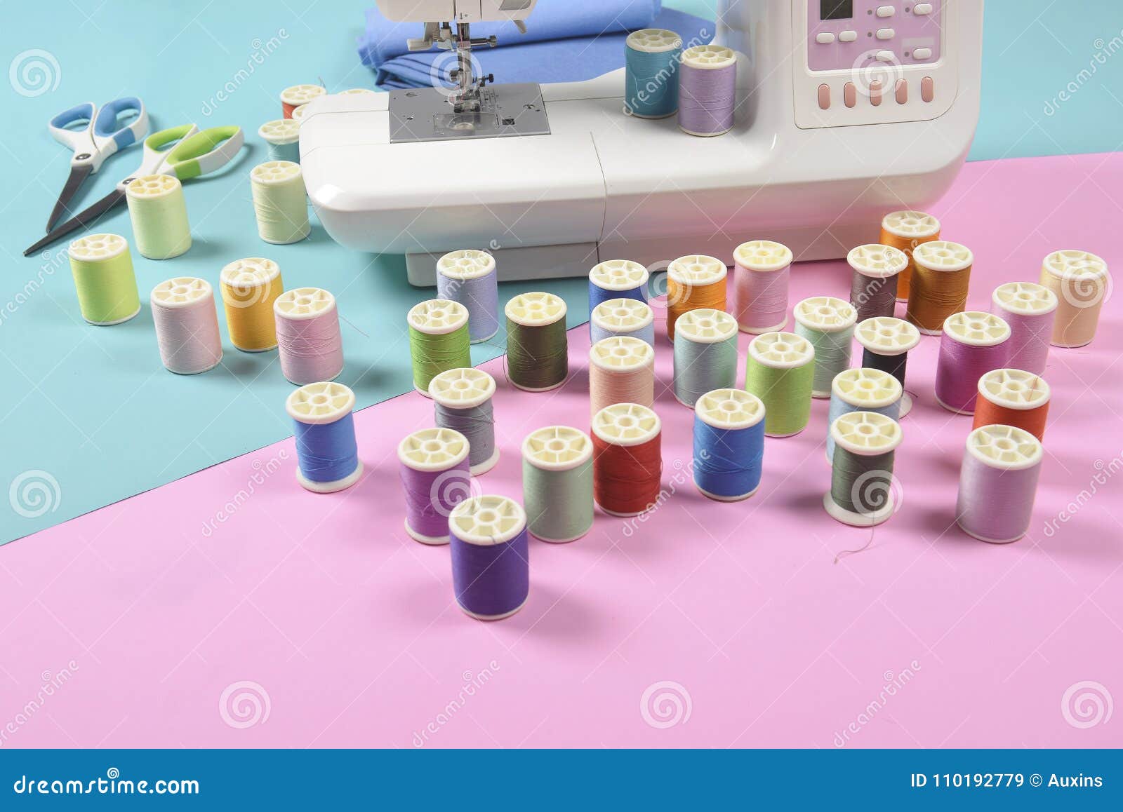 Sewing Machine and Colorful Thread Rolls for Sewing on Two Tone Stock ...