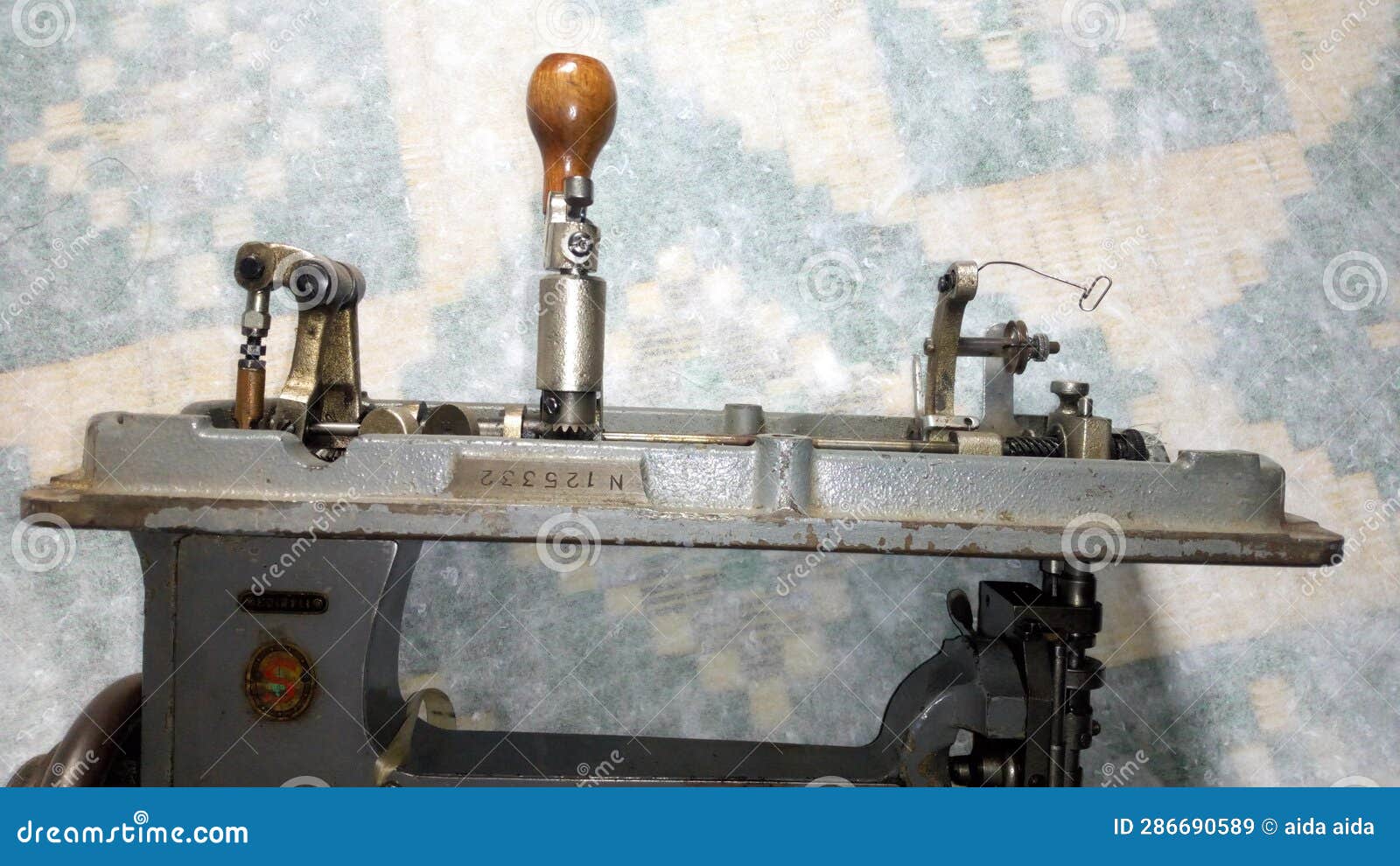 A Sewing Machine that Embroiders Shapes on Various Garments Stock Image ...