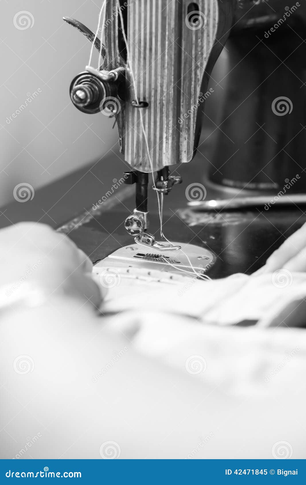 Sewing machine and hand stock image. Image of item, holding - 42471845