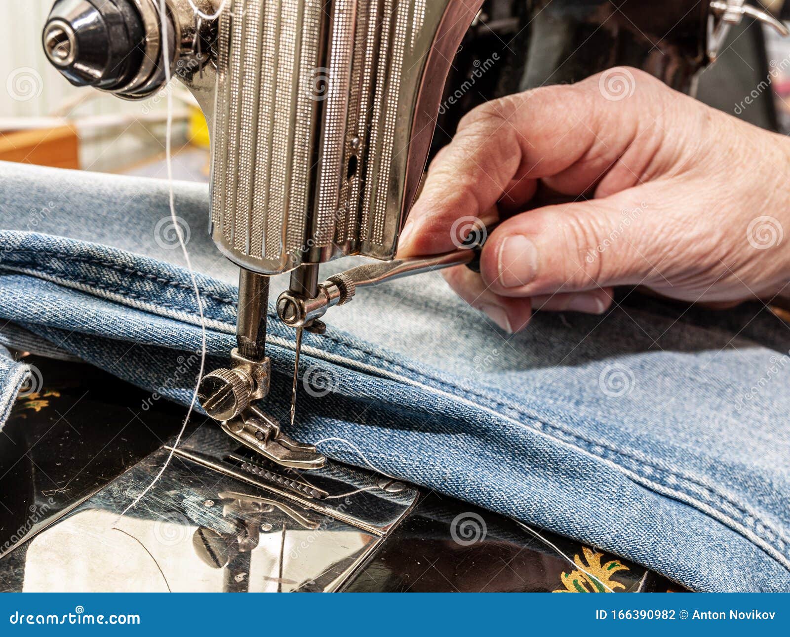 Sewing Machine and Item of Clothing Stock Photo - Image of item ...