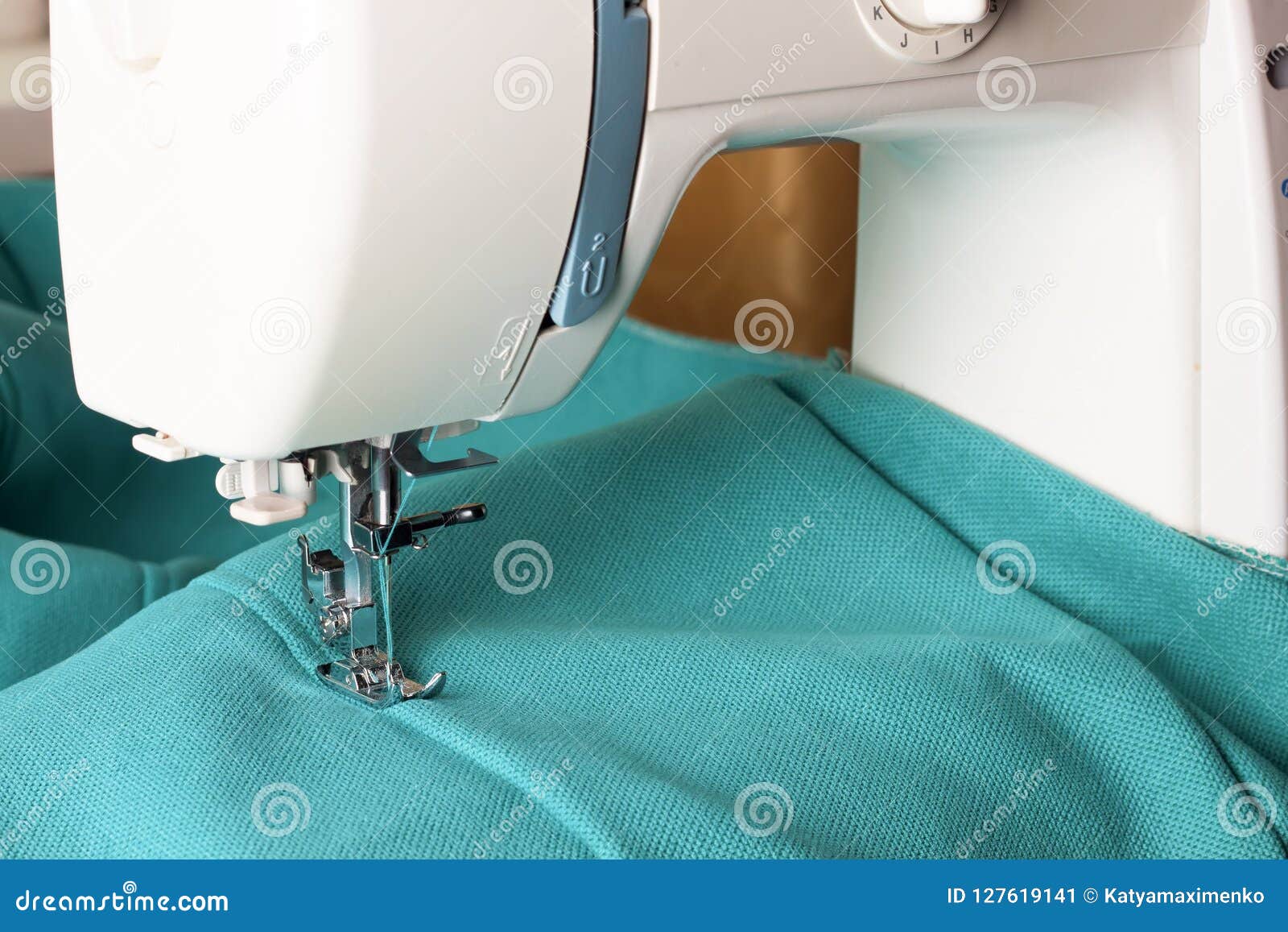 A Sewing Machine and Item of Clothing . Stock Image - Image of craft ...