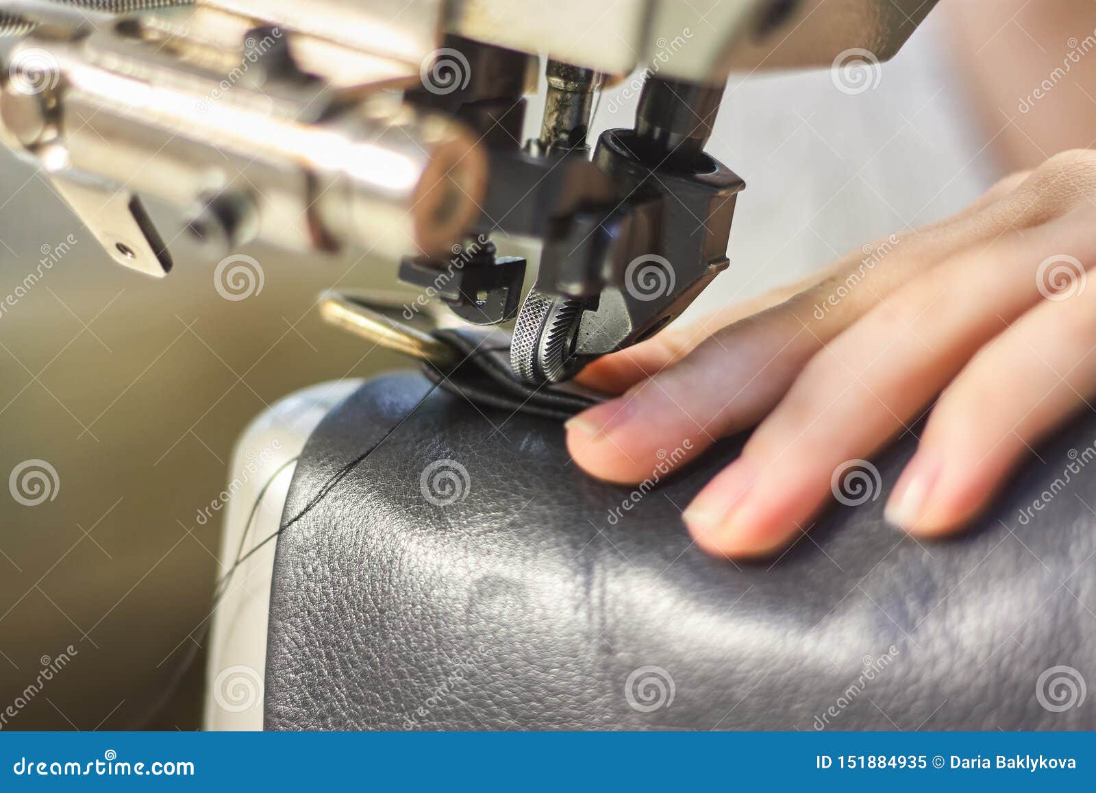 Sewing Machine in a Leather Workshop in Action with Hands Working with ...