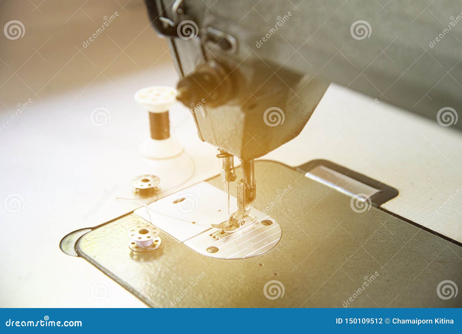 Sewing Machine with a Needle Sews Blue Fabric,blank Space for the Text ...