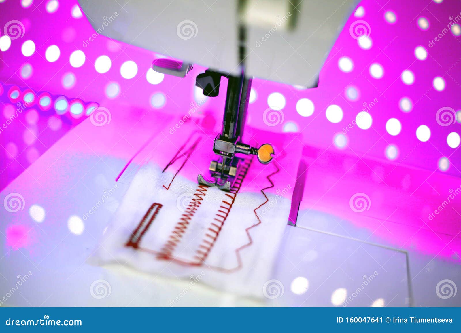 Sewing Machine with a Piece of Fabric Red Thread with Different Lines ...