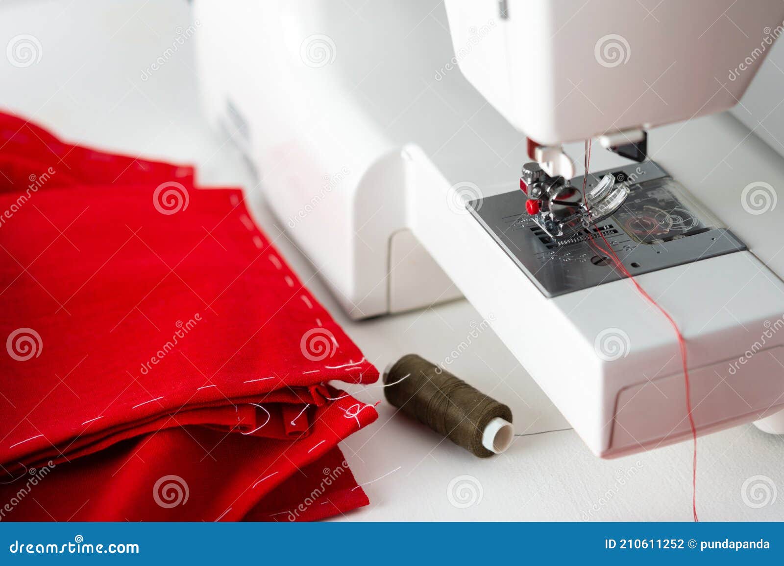 Sewing Machine with Red Fabric Stock Photo - Image of hobby, needle ...
