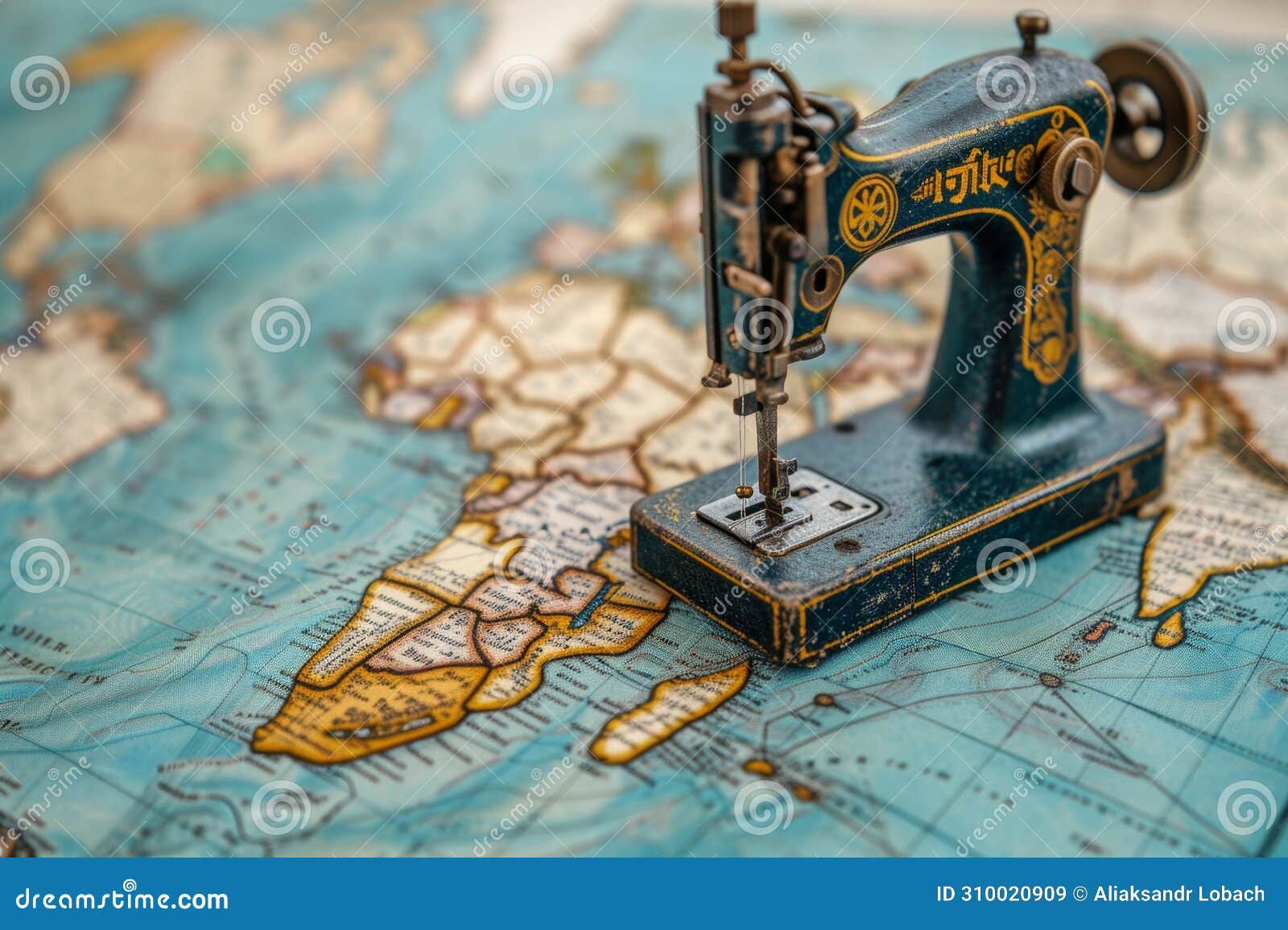 The Sewing Machine Stands on a Fabric with a World Map Pattern ...