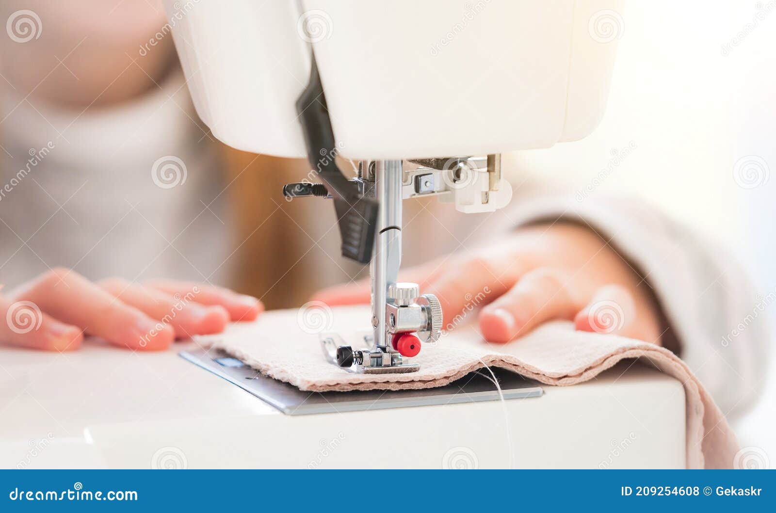 Sewing machine in work stock photo. Image of indoors - 209254608
