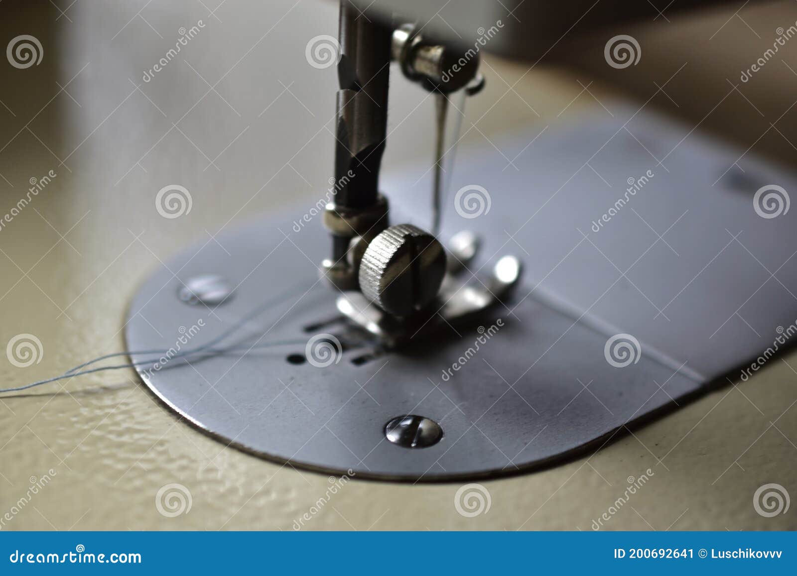 Sewing Machine and Work Surface with Needle and Thread Stock Image ...