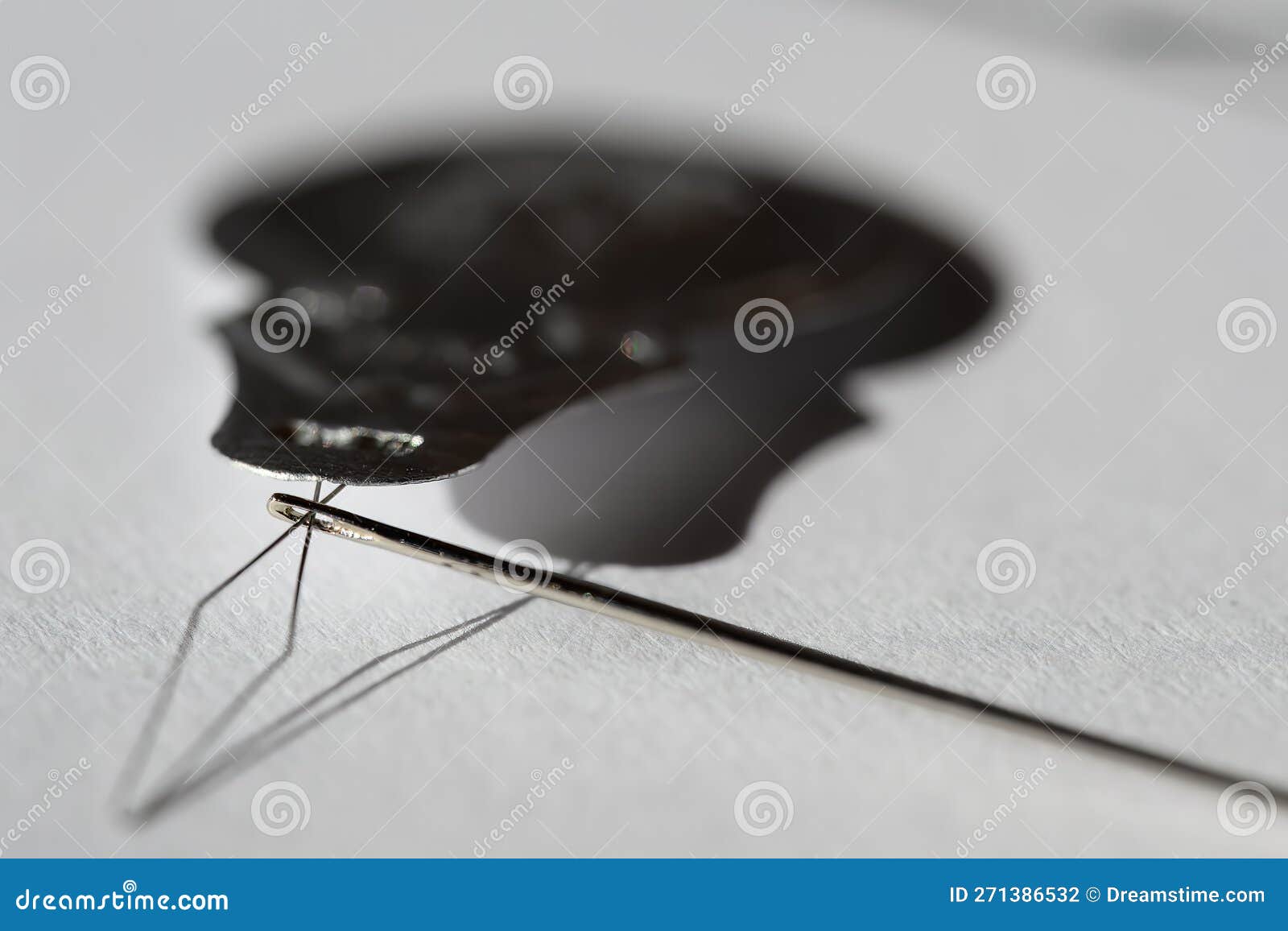 Sewing Needle Threader Tool in Use and a Single Black String. Stock ...