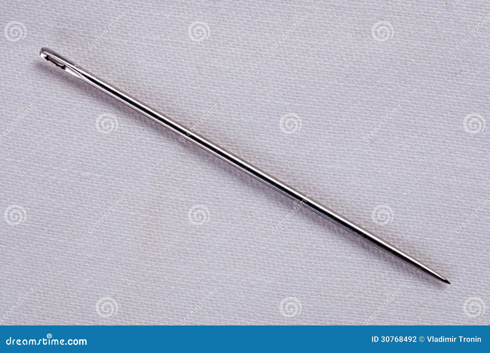 Sewing Needle on a White Cloth Stock Photo - Image of white, pattern ...