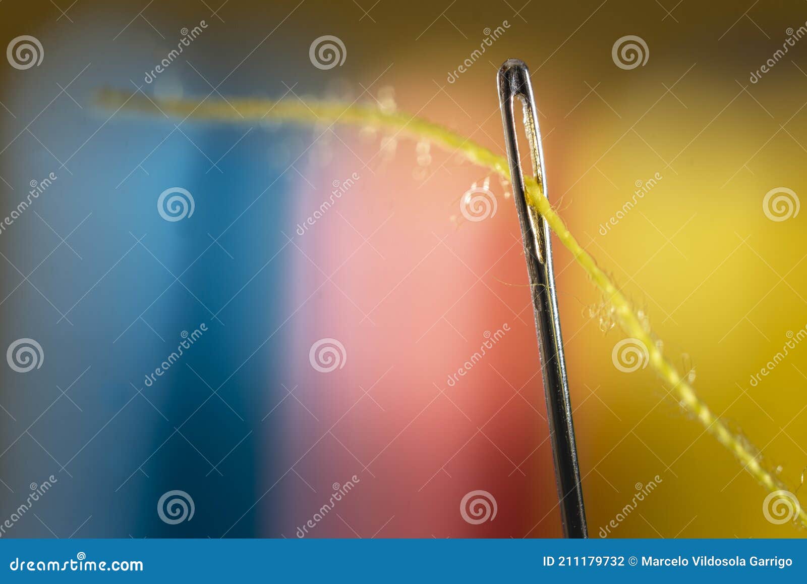 Sewing Needle with Yellow Thread Threaded Stock Photo - Image of steel ...
