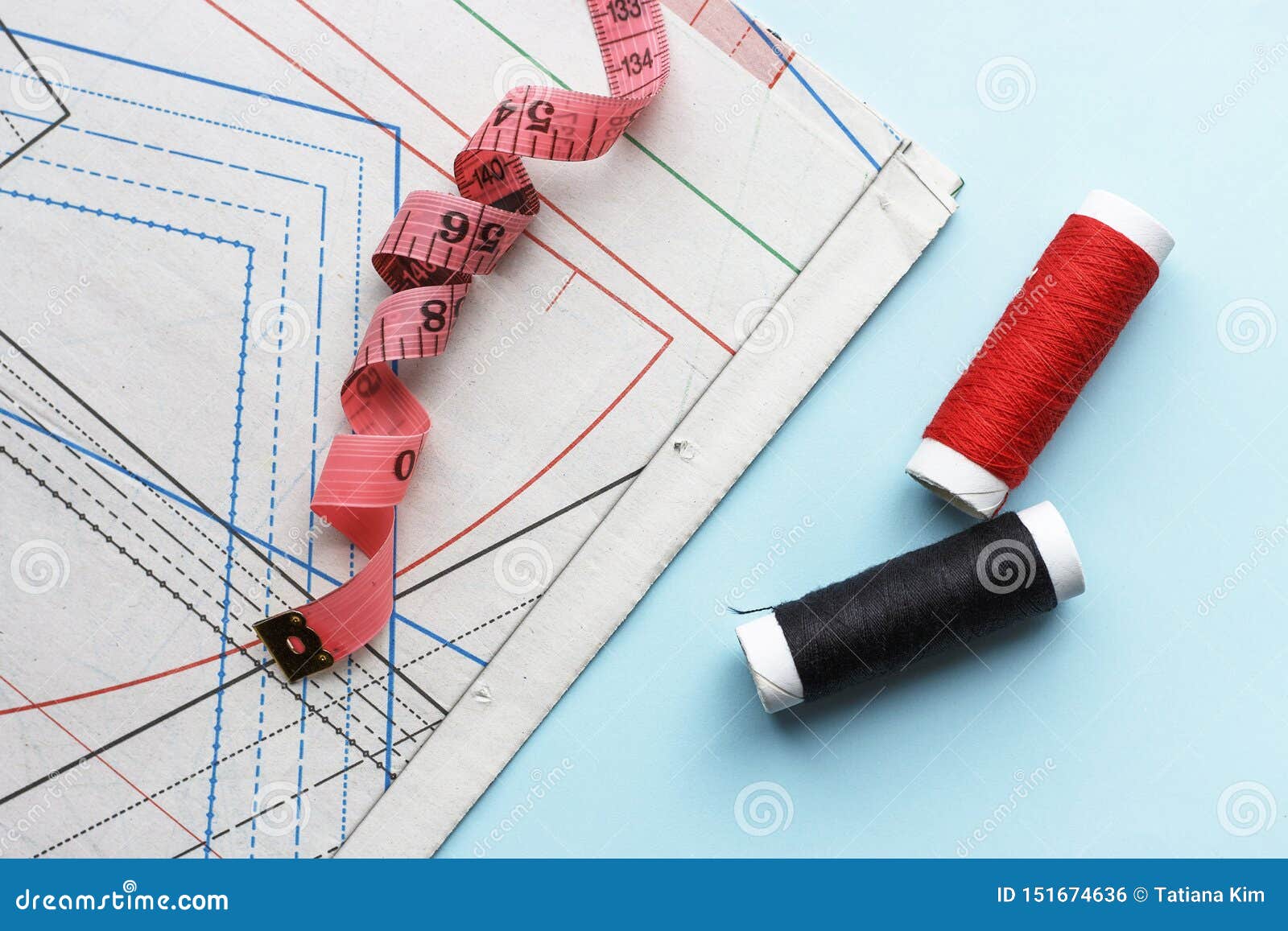 Sewing Pattern, Threads on a Blue Background, Close-up Top View Stock ...