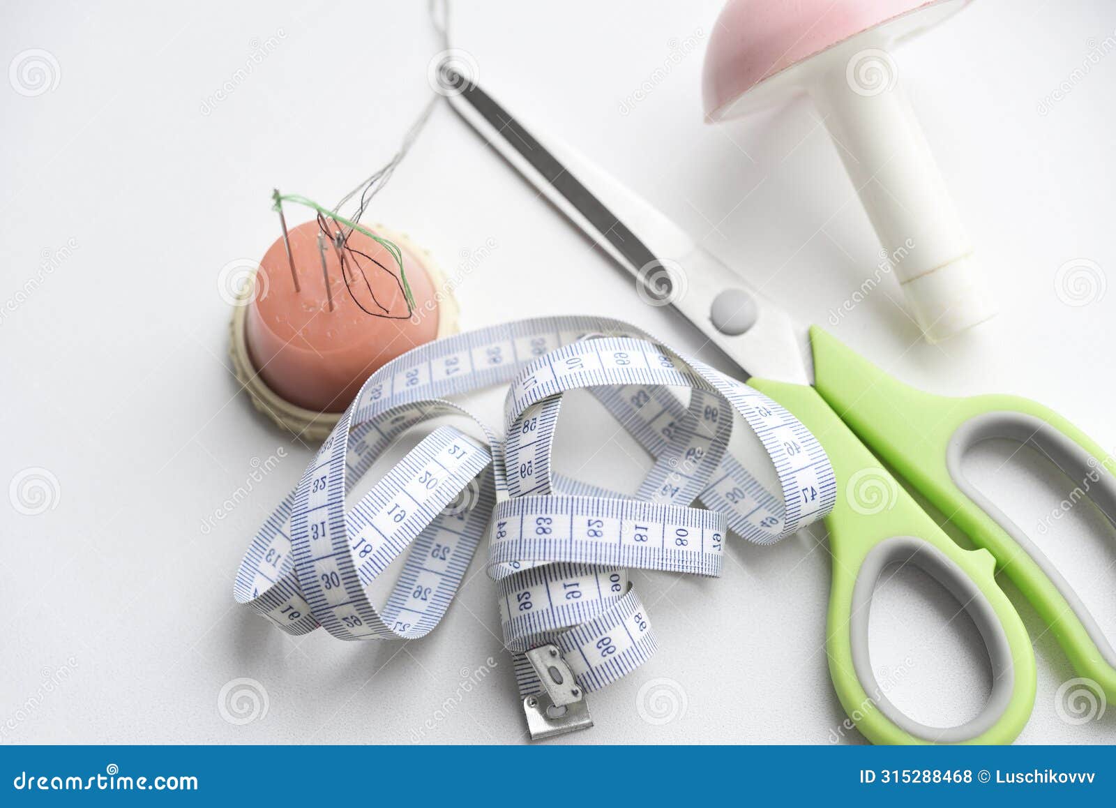 Sewing Scissors, Measuring Tape and Thread with a Needle. Sewing Kit ...