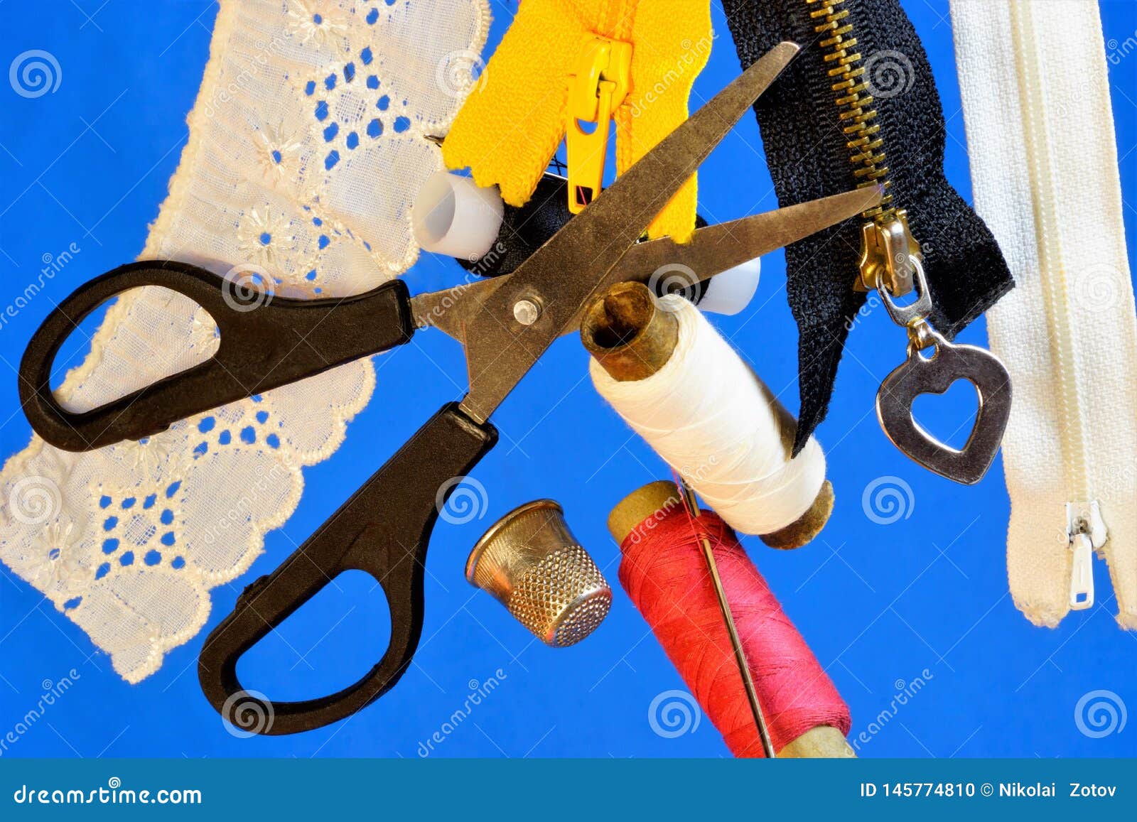 Sewing - a Set of Threads, Vintage Scissors, Needles, Thimble, on a ...