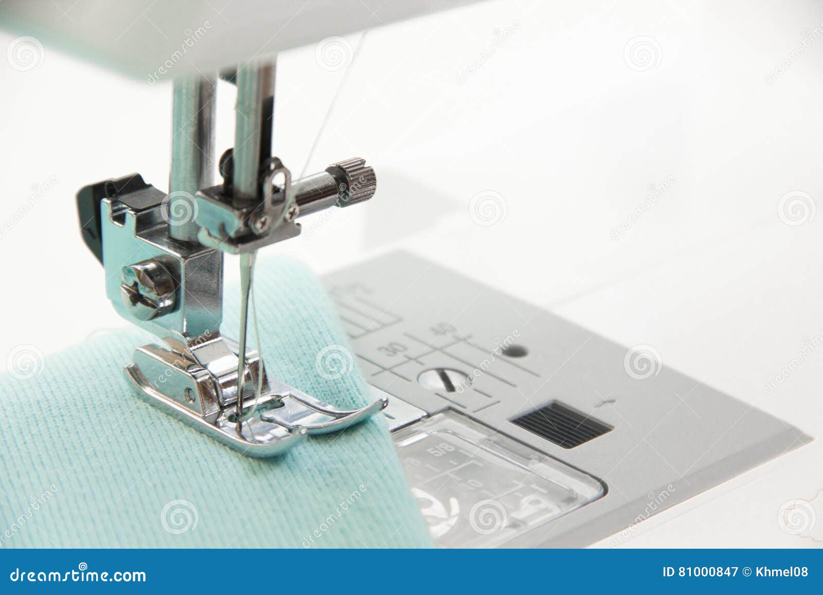 The Sewing on the Sewing Machine Turquoise Fabric Stock Image - Image ...
