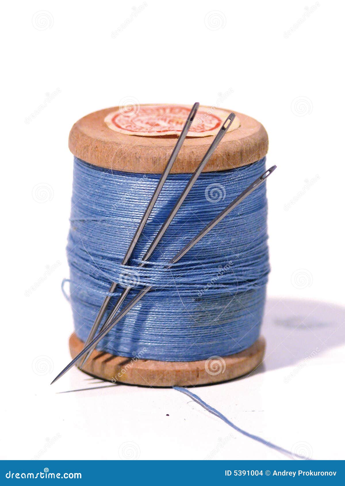 Sewing Spool with a Needle. a Sewing Needle Stock Photo - Image of ...