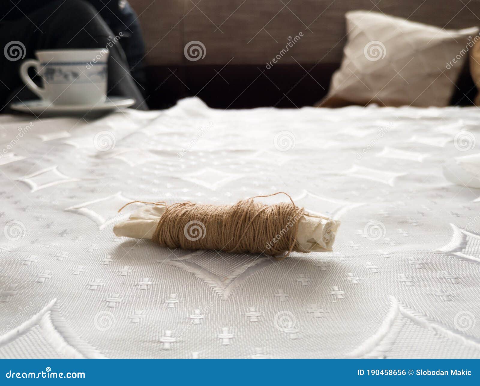 Sewing Thread Isolated on a White Tablecloth in the Living Room Stock ...