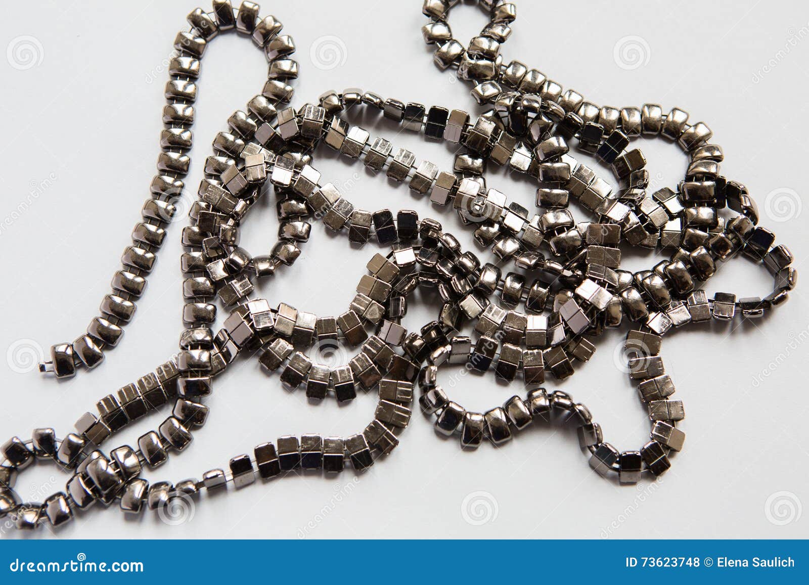 Sewing Thread with Silver Stones Stock Photo - Image of chain ...