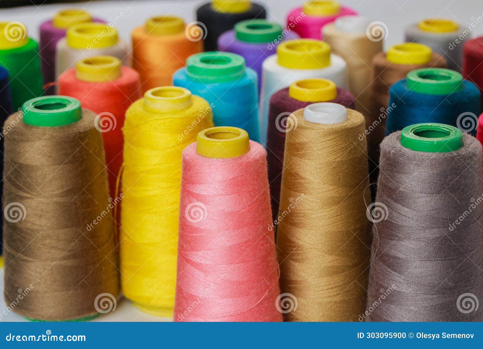 Sewing Thread Spools in Different Colors. Stock Photo - Image of yarn ...