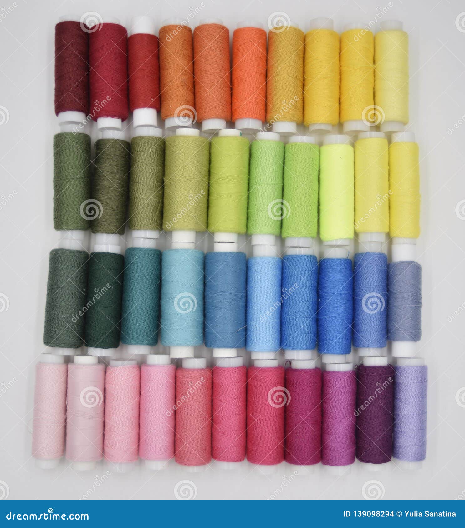 Sewing Threads on the Background Stock Photo - Image of yellow, colors ...