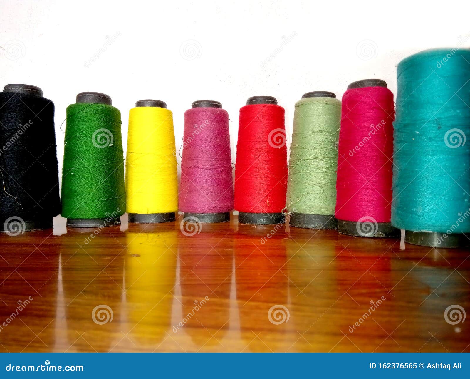 Sewing Threads, Stitching Threads, Tailoring Threads on Table Stock ...