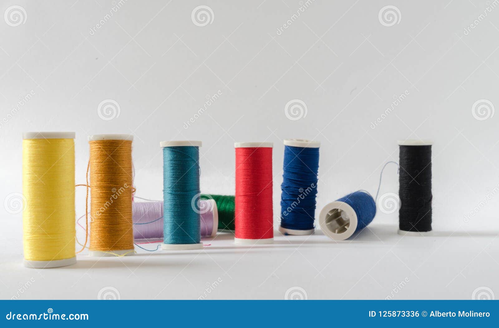 Sewing Threads in a White Background Stock Photo - Image of bobbin ...