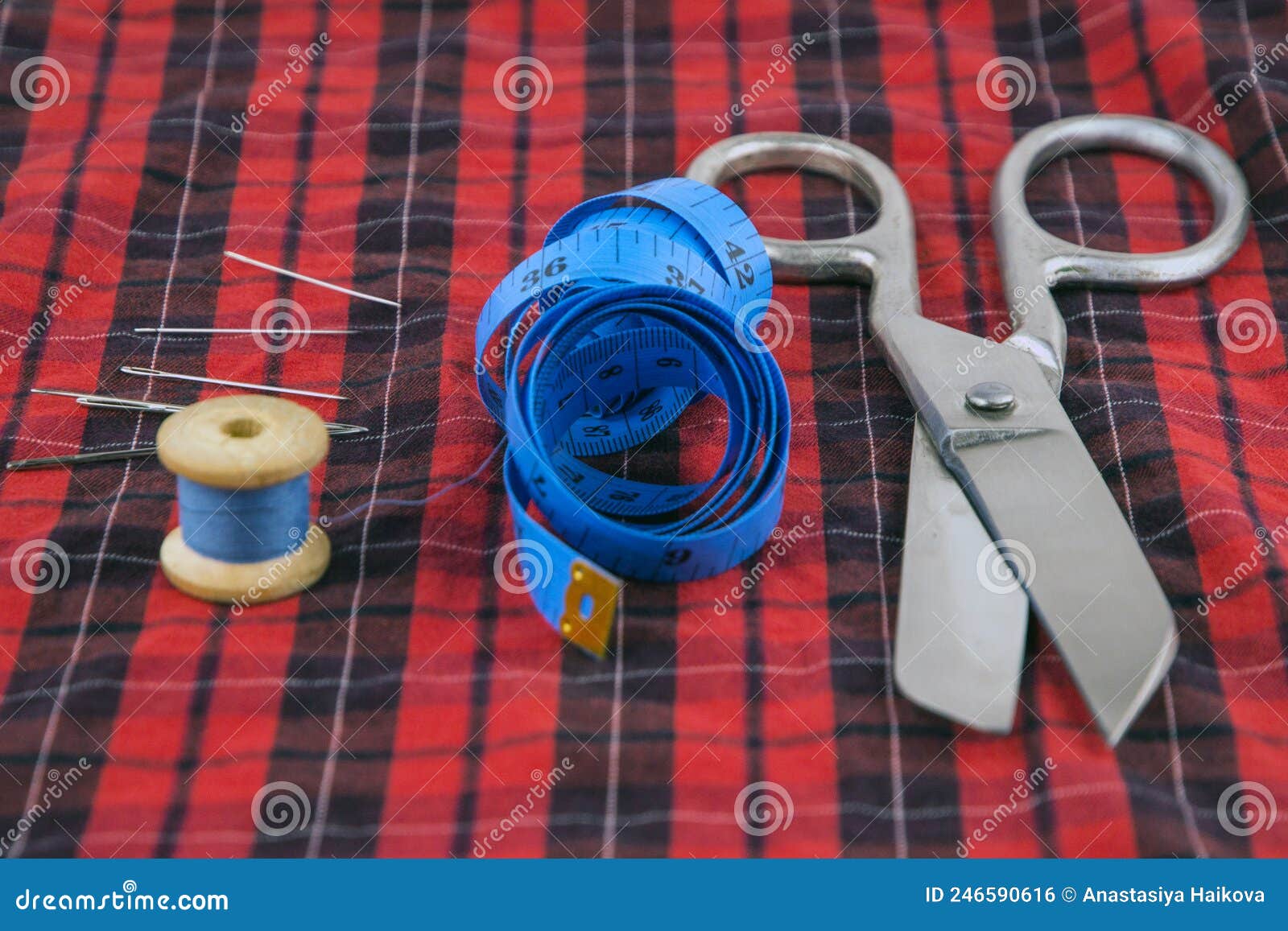 Sewing Tools: Large Scissors, Unwound Measuring Tape and Thread with ...
