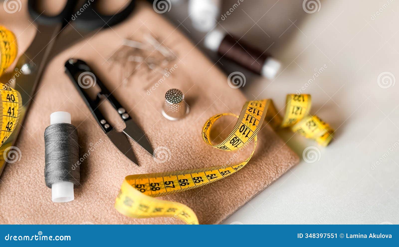 Sewing Tools and Materials on Fabric with Tape Measure and Scissors ...