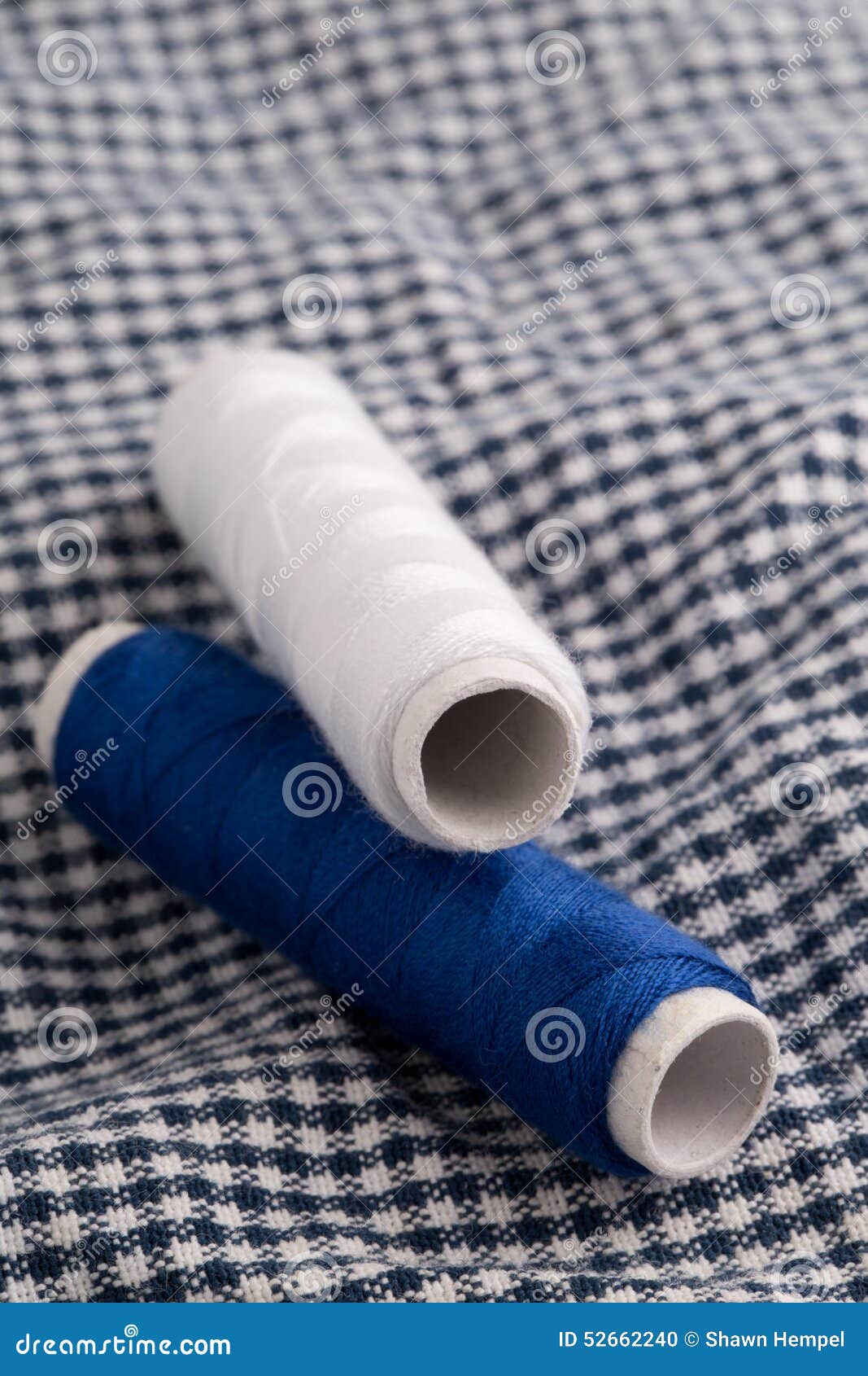 Sewing Yarn Rolls on Fabric Stock Photo - Image of pattern, craft: 52662240