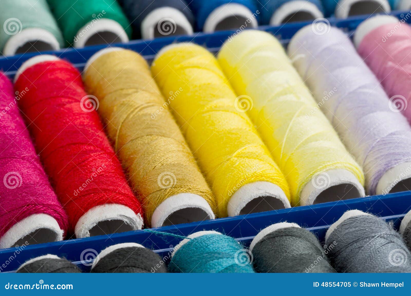Sewing yarn spools stock image. Image of fiber, coil - 48554705