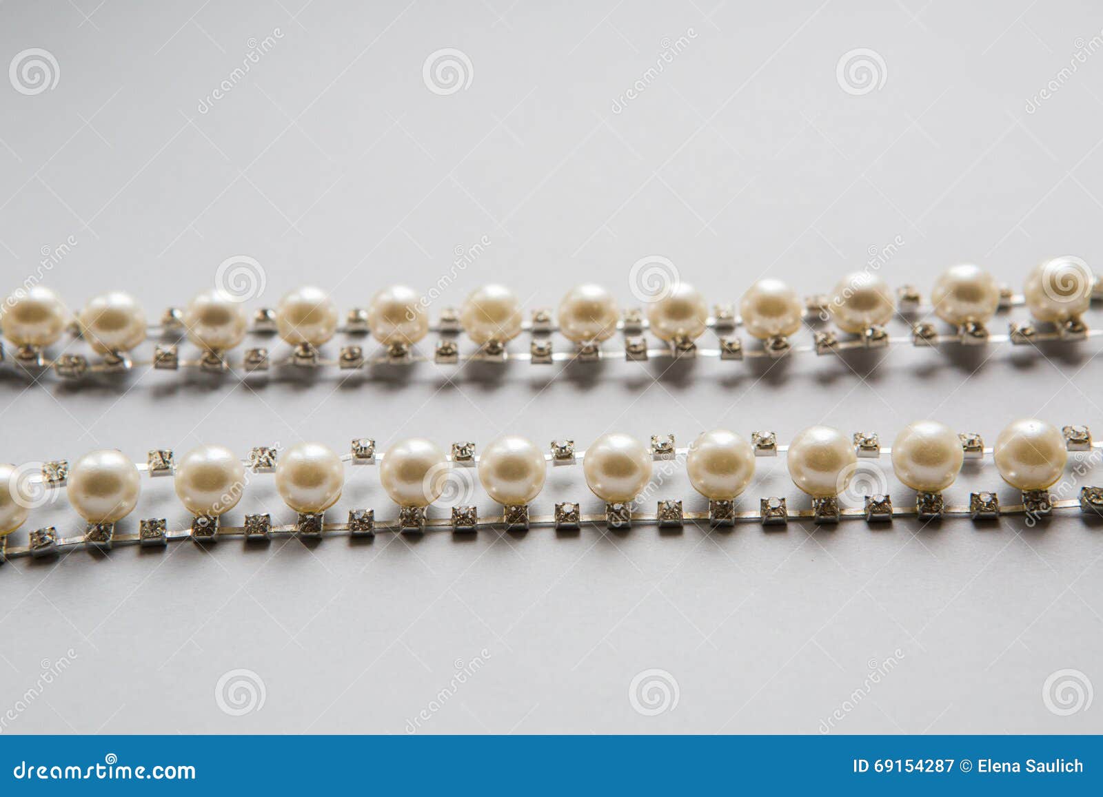 Sewn White Thread with Beads Stock Image - Image of white, pearls: 69154287