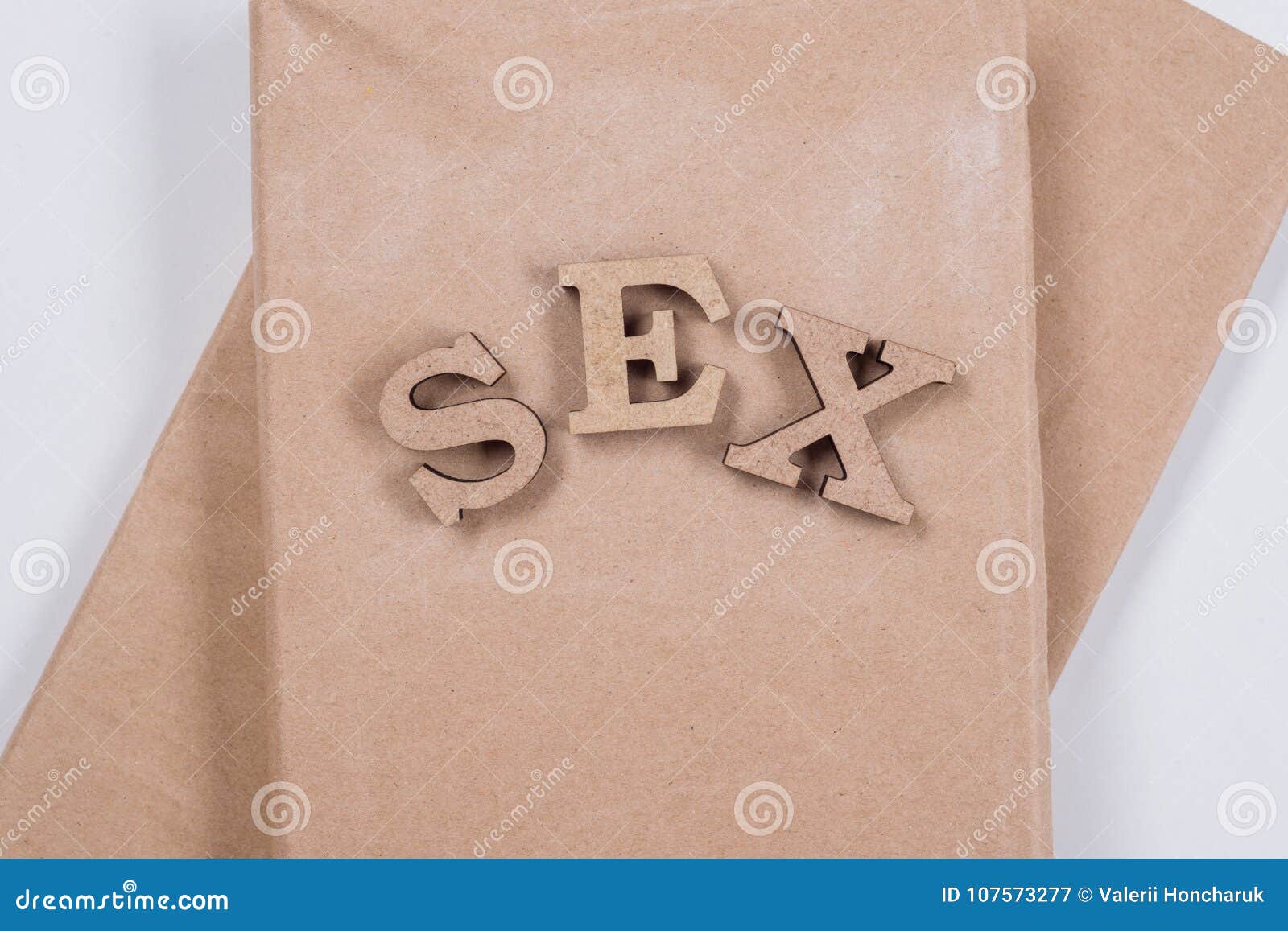 Sex Education Old Book With A Word Of Sex In Wooden Letters Stock