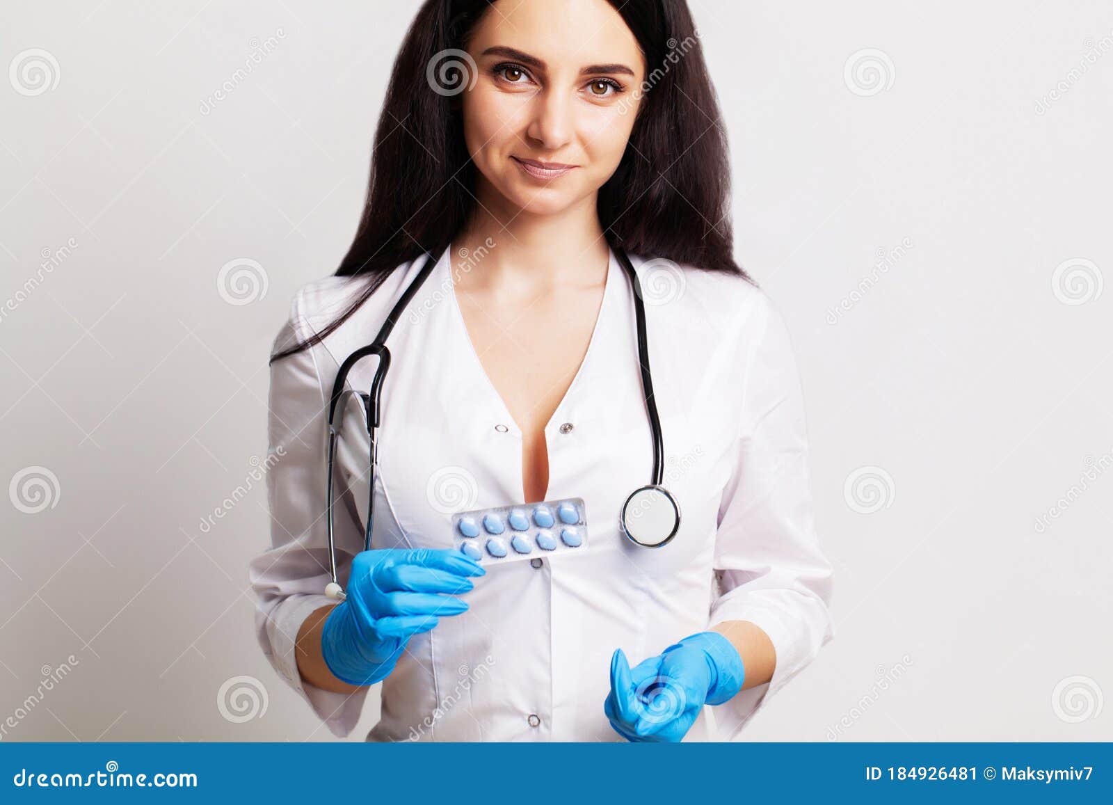 Sexual Health A Doctor In A White Coat Holding A Pill For A Healthy